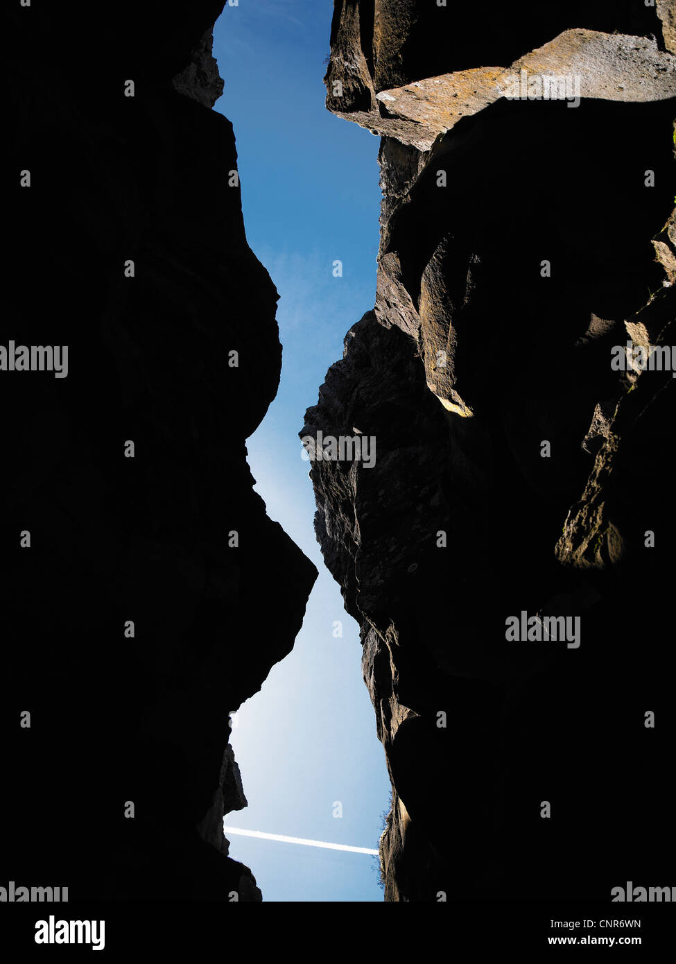 Crevice between steep rock faces Stock Photo - Alamy