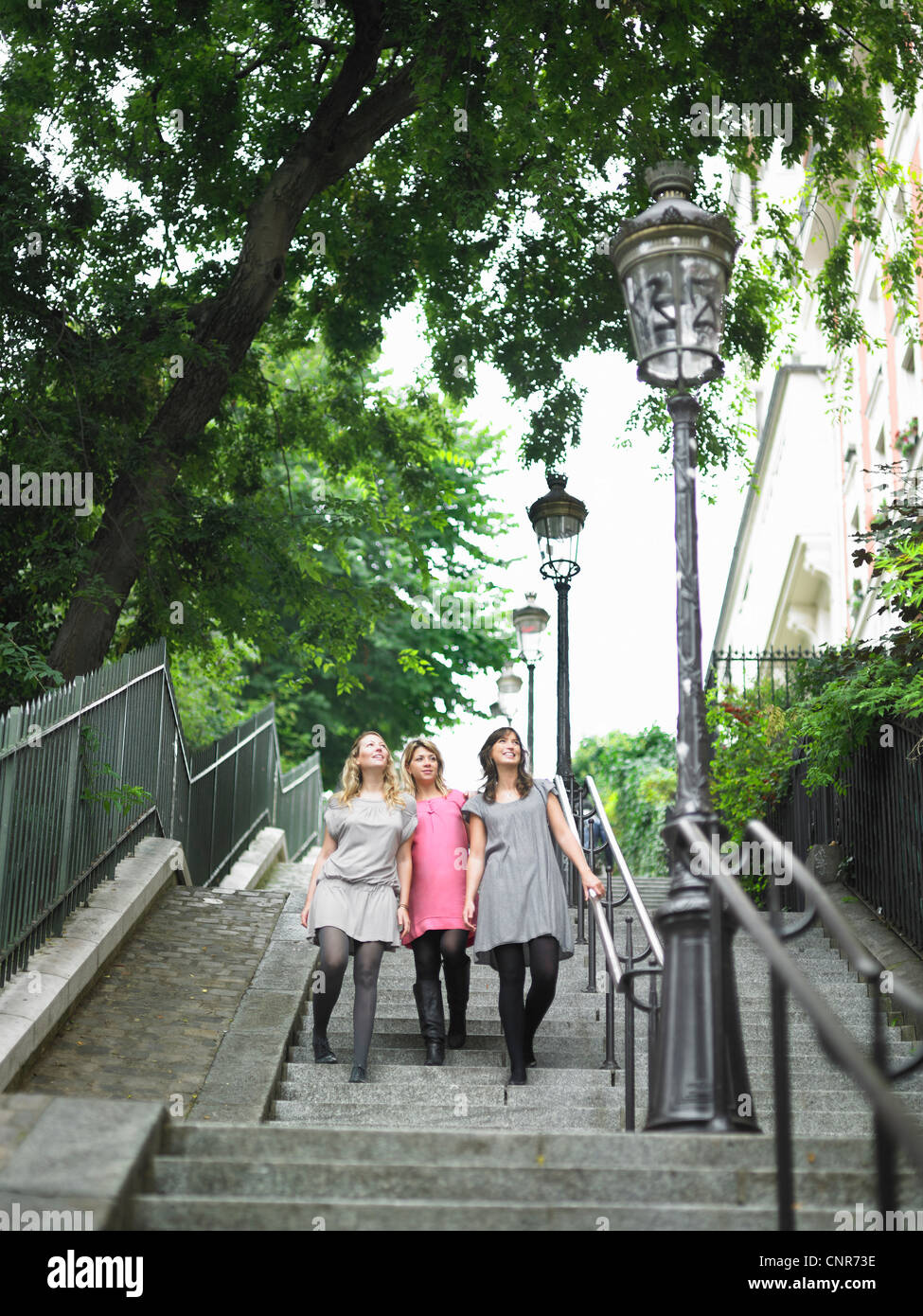 Women Relaxing Together On Steps High Resolution Stock Photography and ...