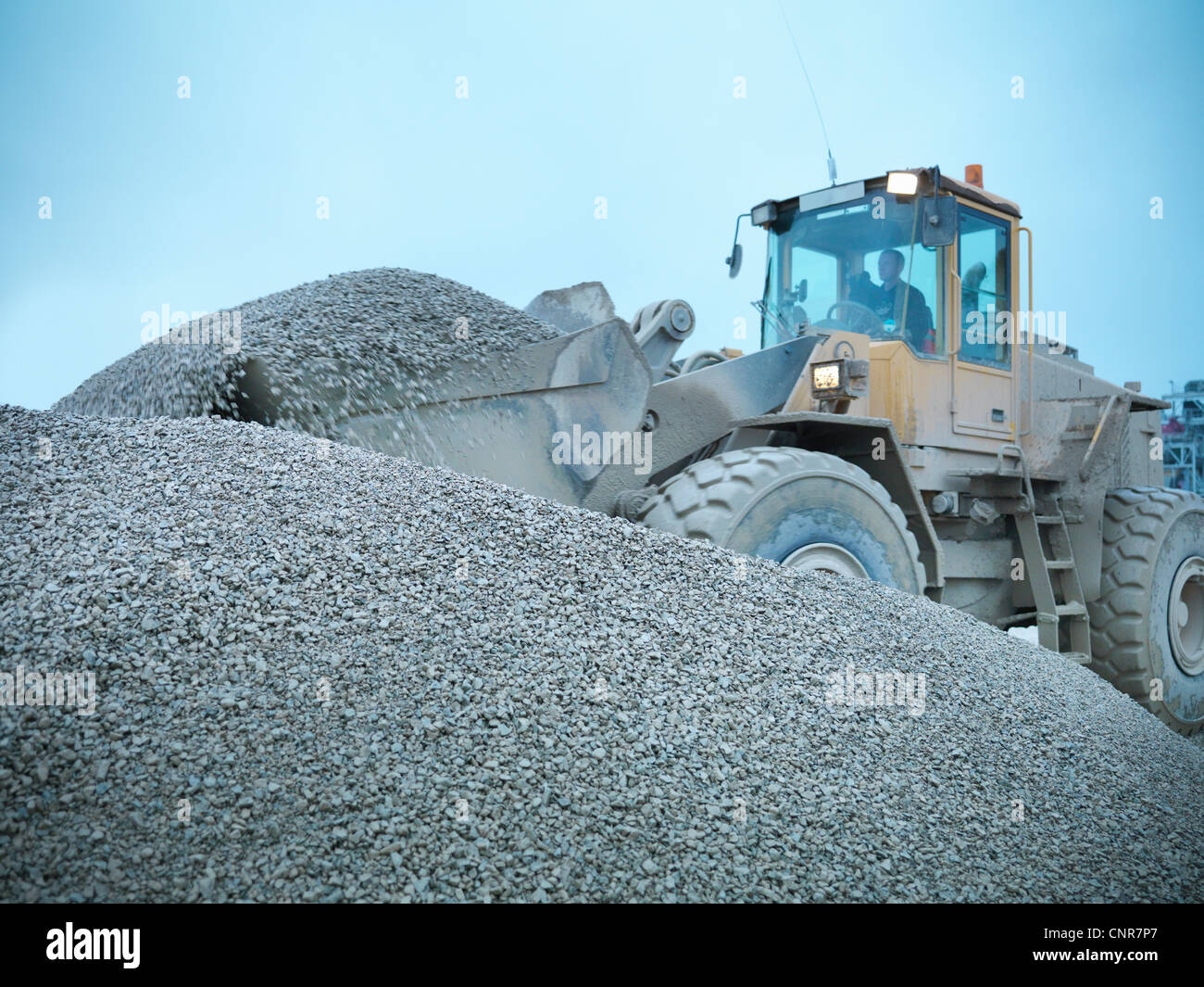 Construction worker shoveling gravel hi-res stock photography and ...