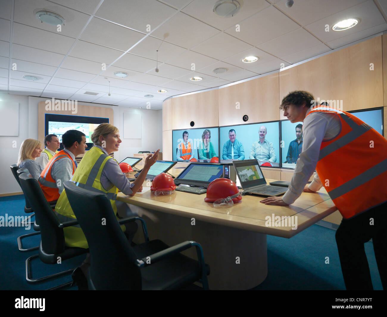 Asian businessman watching tv hi-res stock photography and images - Alamy