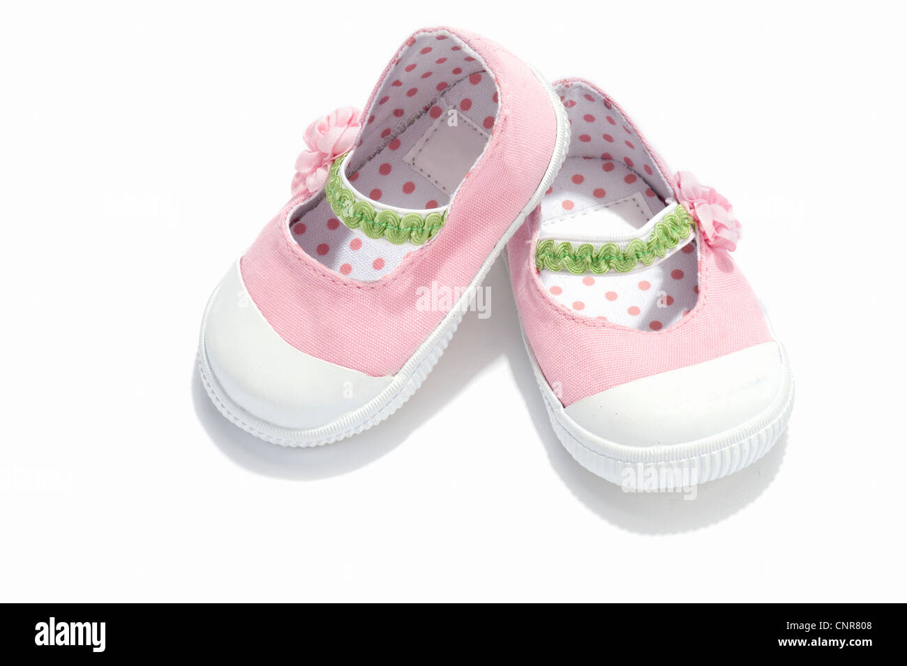 A pair of pink baby shoes Stock Photo - Alamy