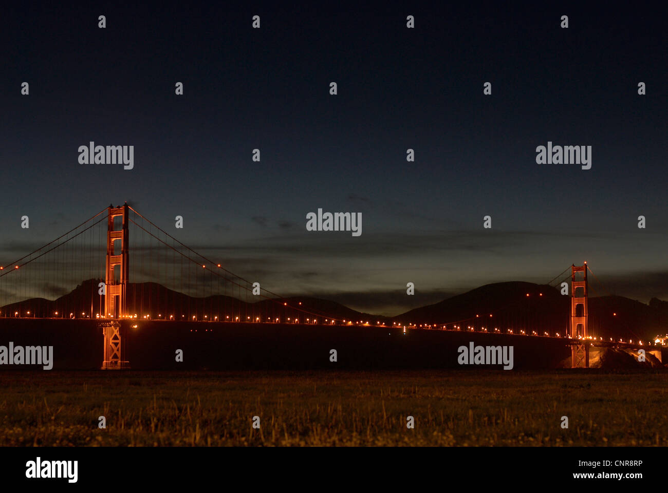 Golden Gate Bridge lit up at night Stock Photo - Alamy