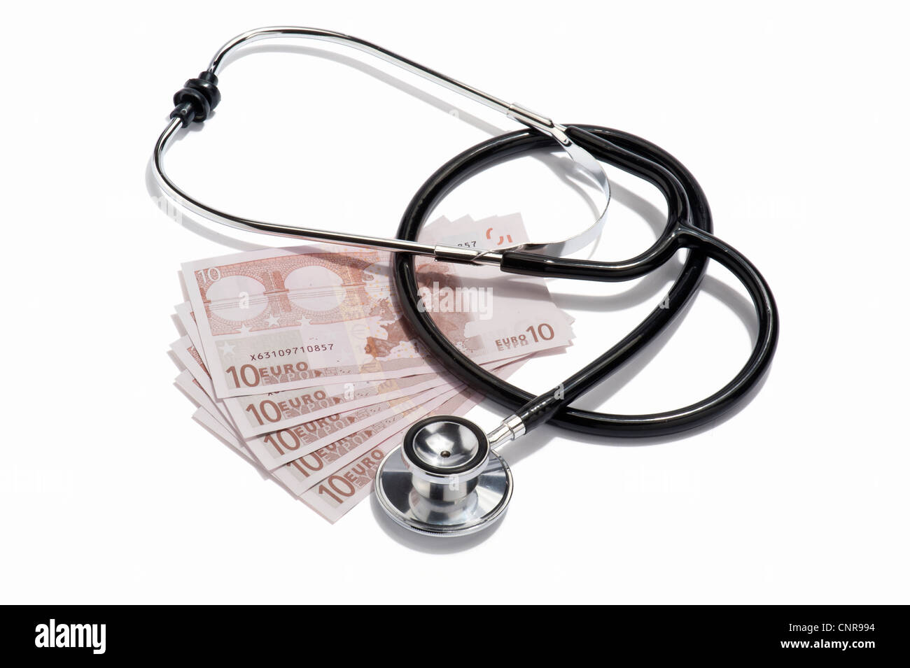 A doctors stethoscope and Euro notes Stock Photo - Alamy