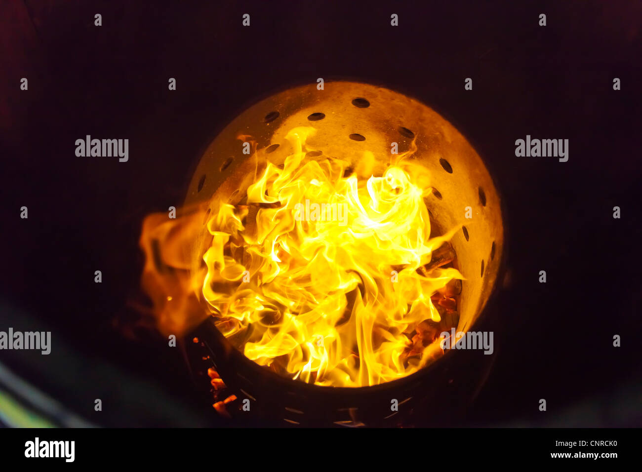 Flames from the brazier installed at the bottom of the barrel., The ...