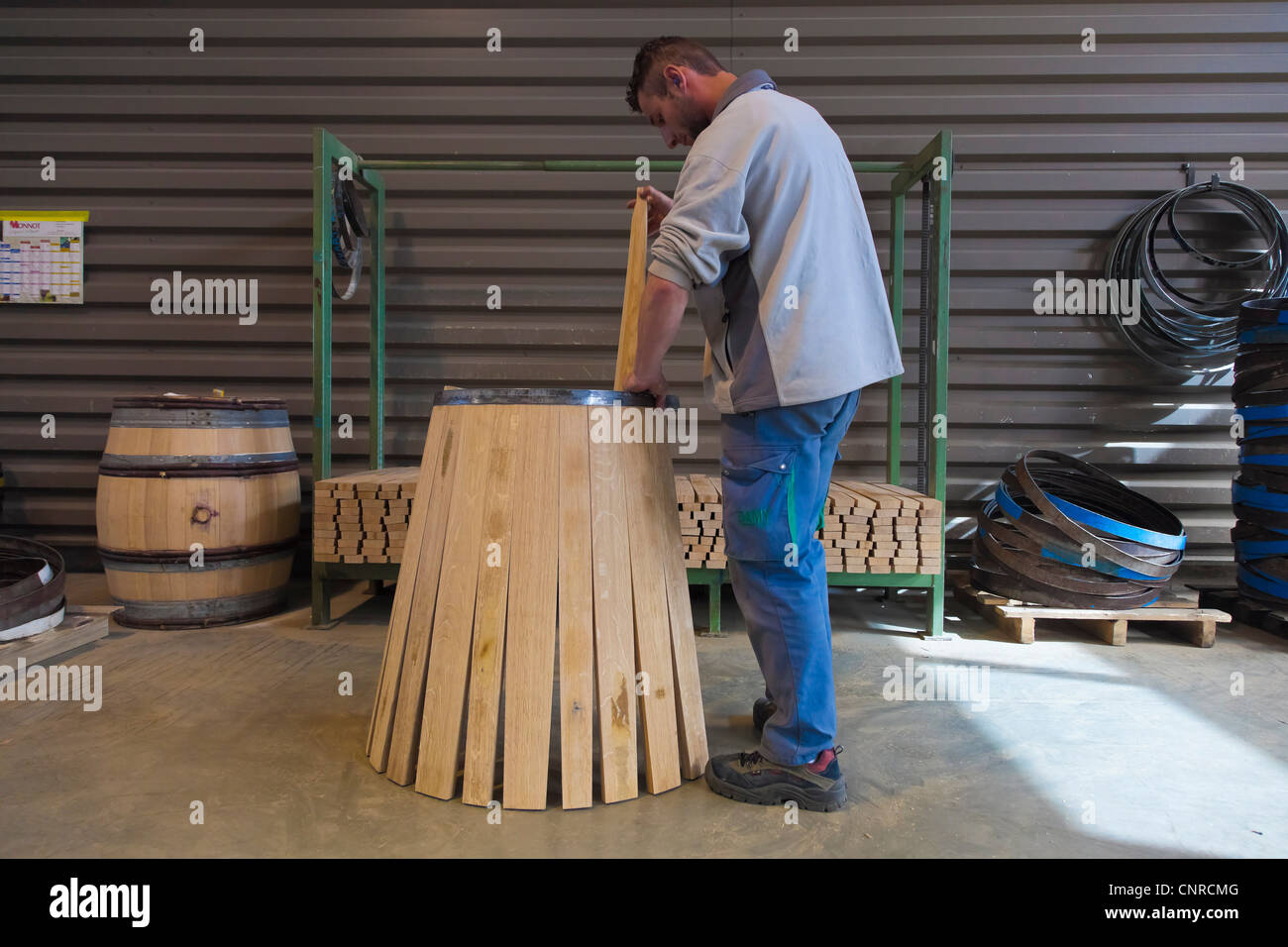 The hooping process., Cooperage Damy Father and Sun. Meursault, France ...