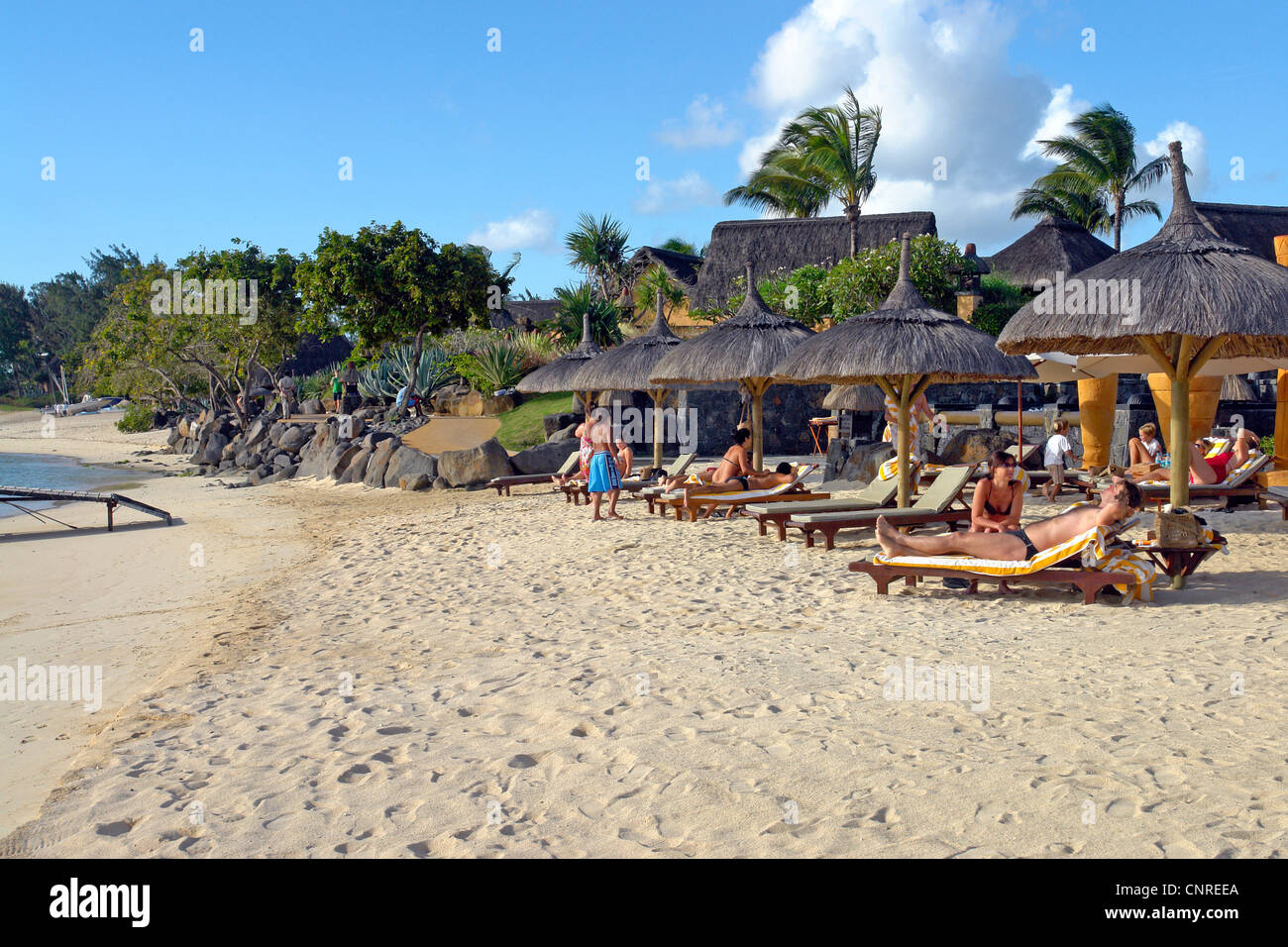 Mauritius island beach sunbathing hi-res stock photography and images ...