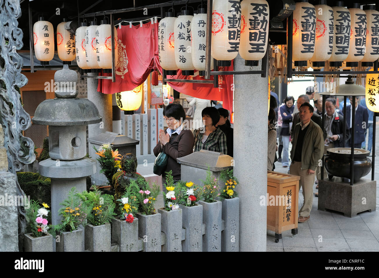Japanese people queuing at Hozen-Ji, Osaka, Japan Stock Photo - Alamy
