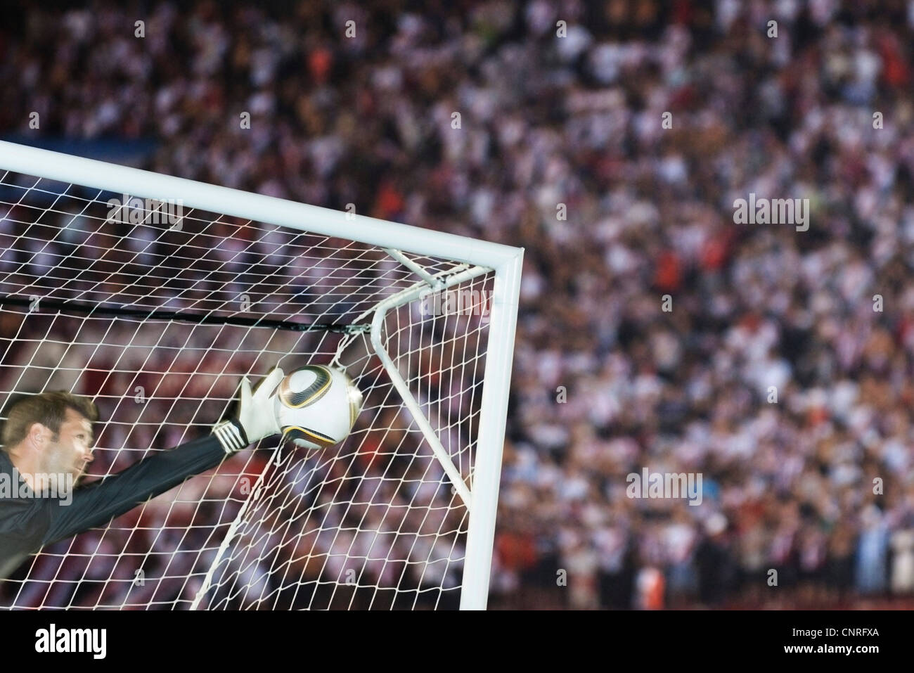 Soccer goalie blocking goal hi-res stock photography and images - Alamy
