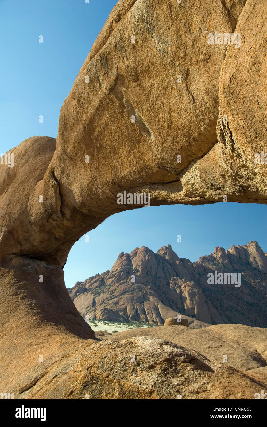 view through a rock arch on Spitzkoppe and Small Spitzkoppe, Namibia, Damaraland Stock Photo - Alamy