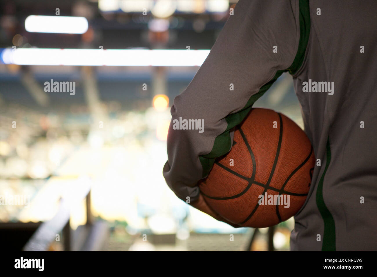 Man looking down at stadium, rear view Stock Photo - Alamy
