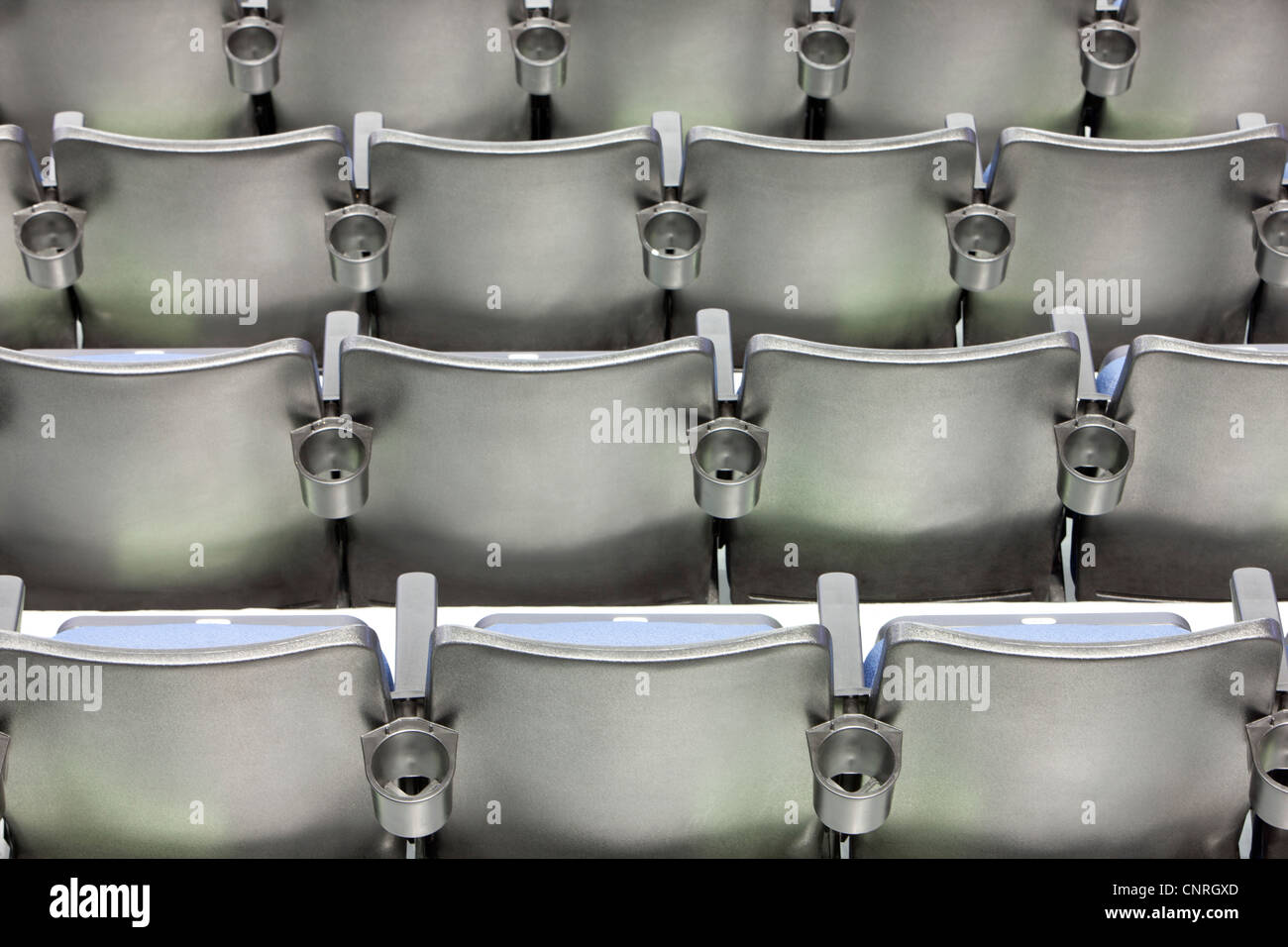 Rows of chairs, rear view Stock Photo - Alamy