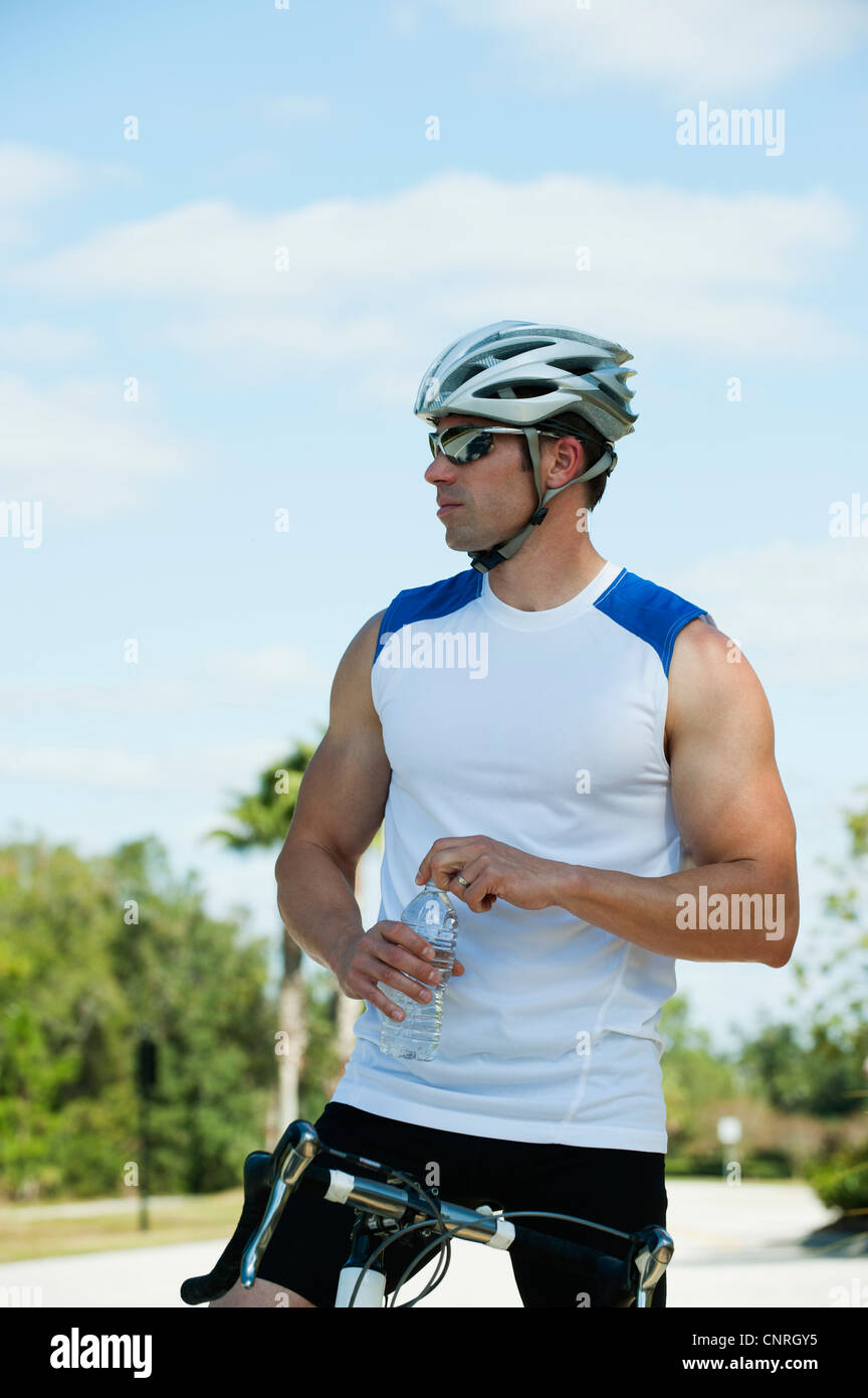 Cyclist rests hi-res stock photography and images - Alamy