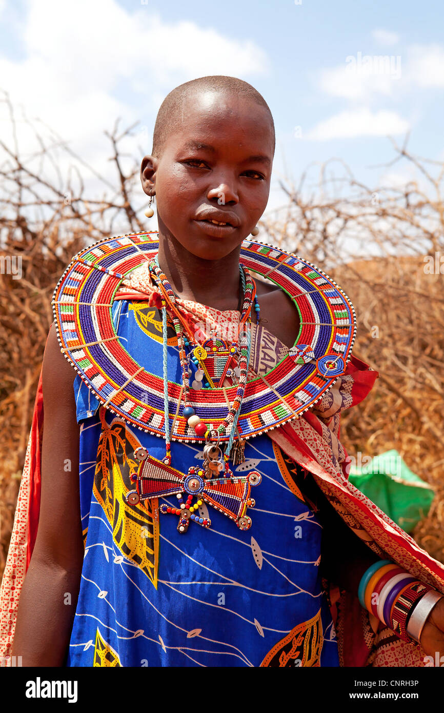 AFRICA, KENYA, MASAI MARA - JULY 2: Masai woman is showing traditional ...