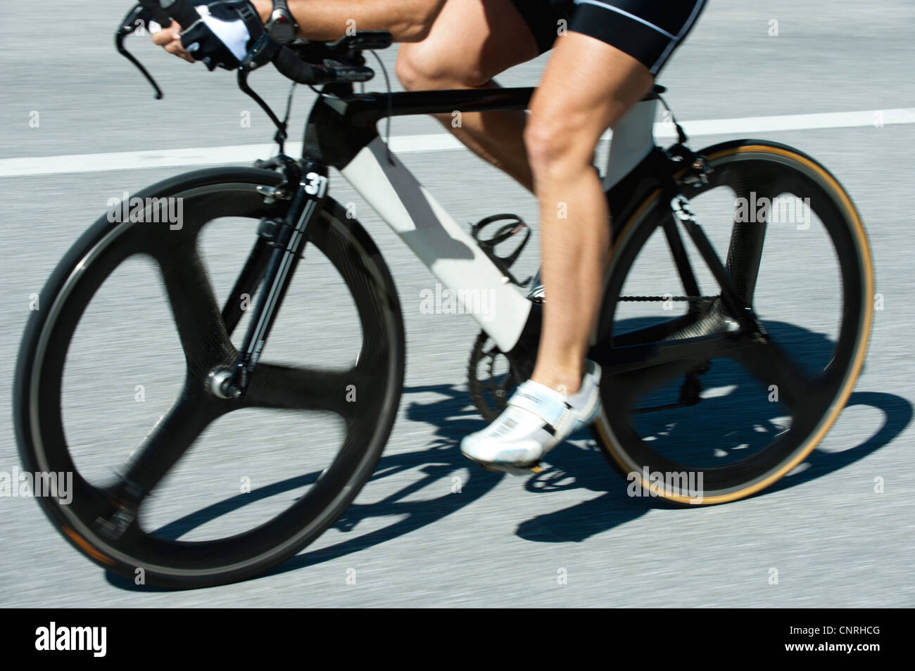 Woman riding road bike low hi-res stock photography and images - Alamy