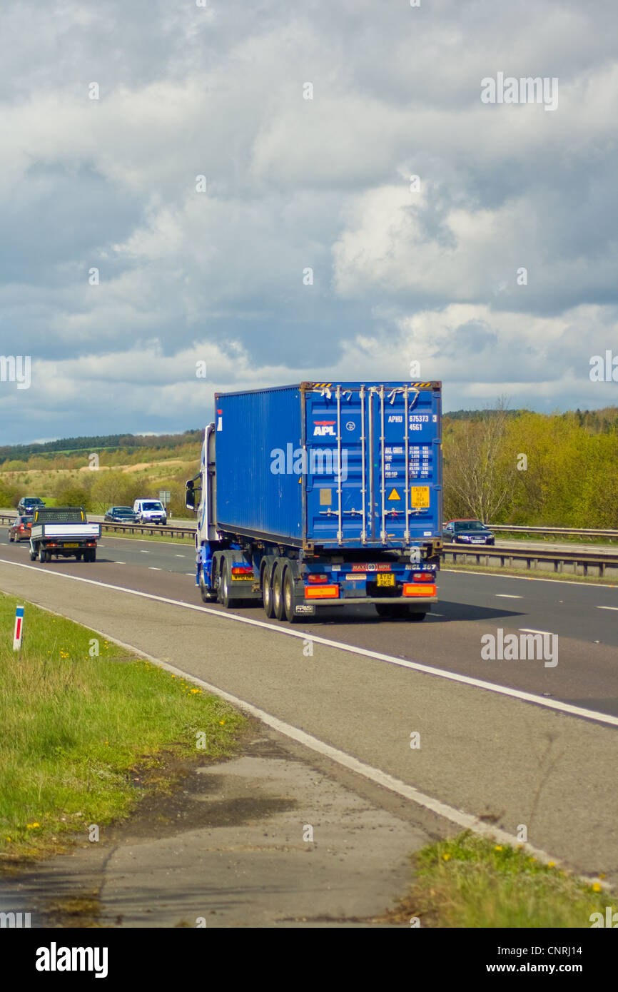 Blue Container HGV on M1 motorway near to junction 38 Stock Photo - Alamy