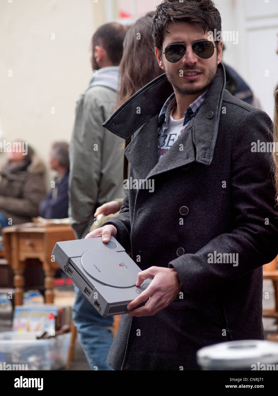 A possible purchase of an old play-station console Stock Photo - Alamy