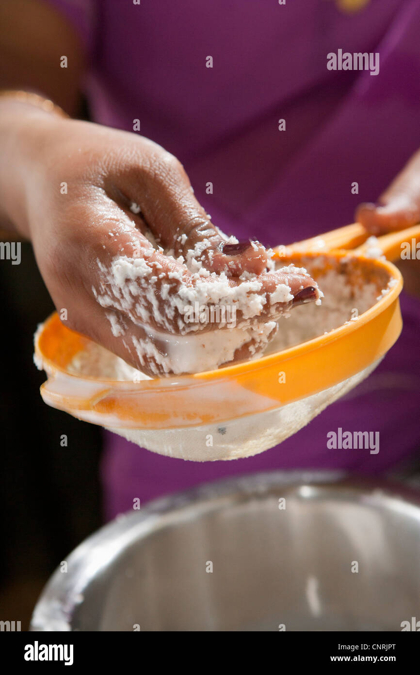 Preparing fresh coconut Stock Photo - Alamy