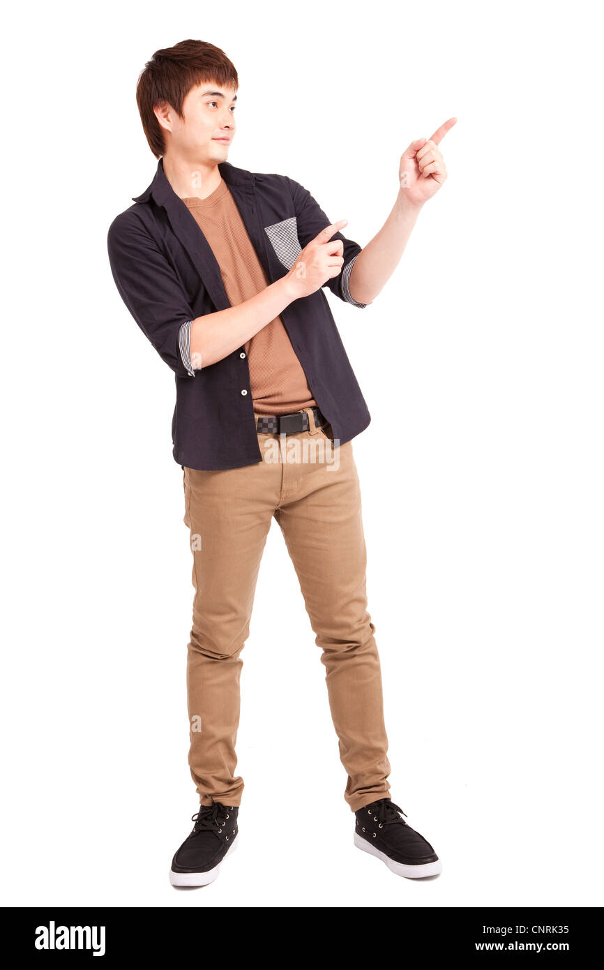 Asian young man pointing something Stock Photo - Alamy