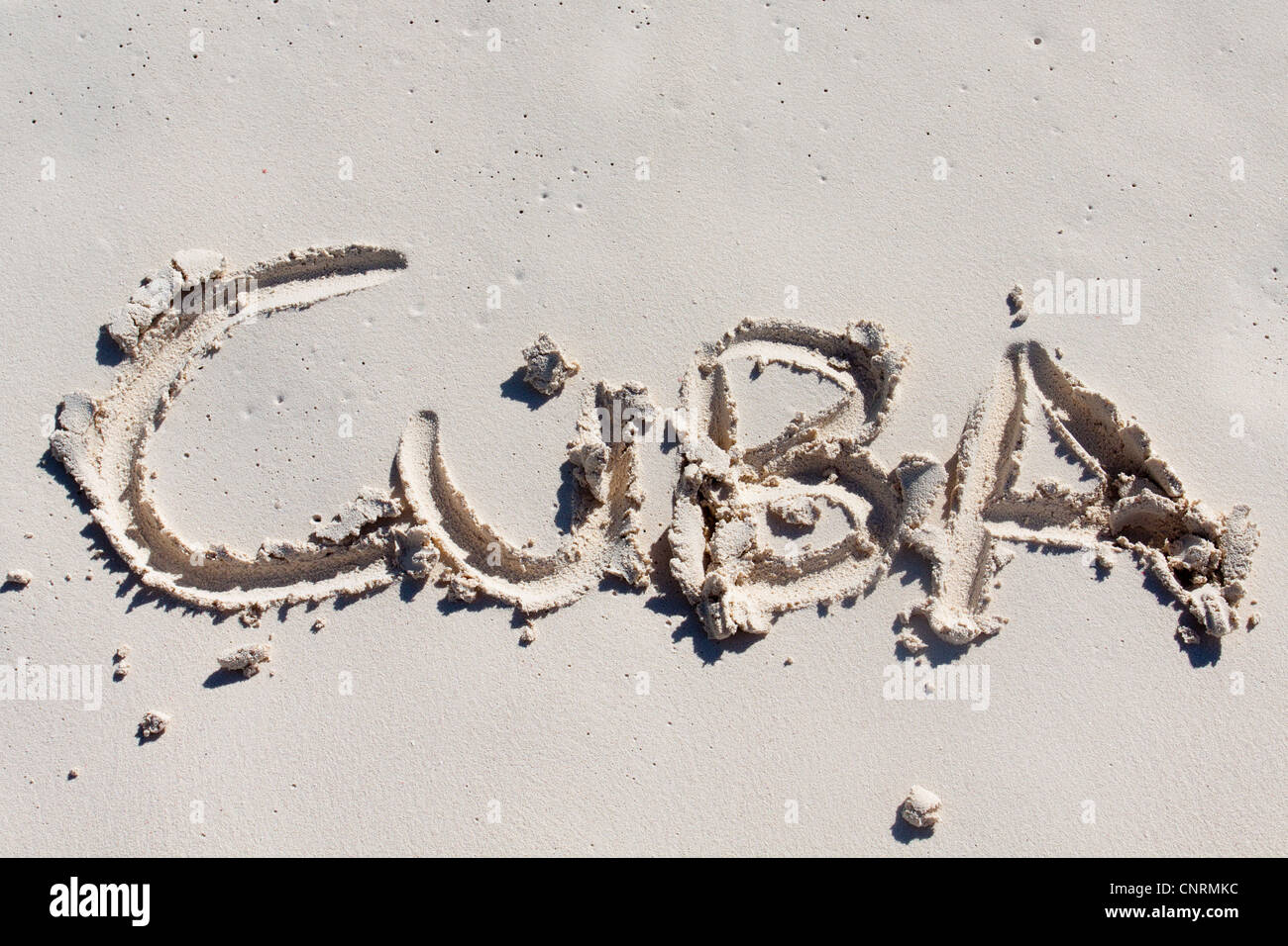 Cuba carved on the white sand of a beach in Cuba Stock Photo - Alamy