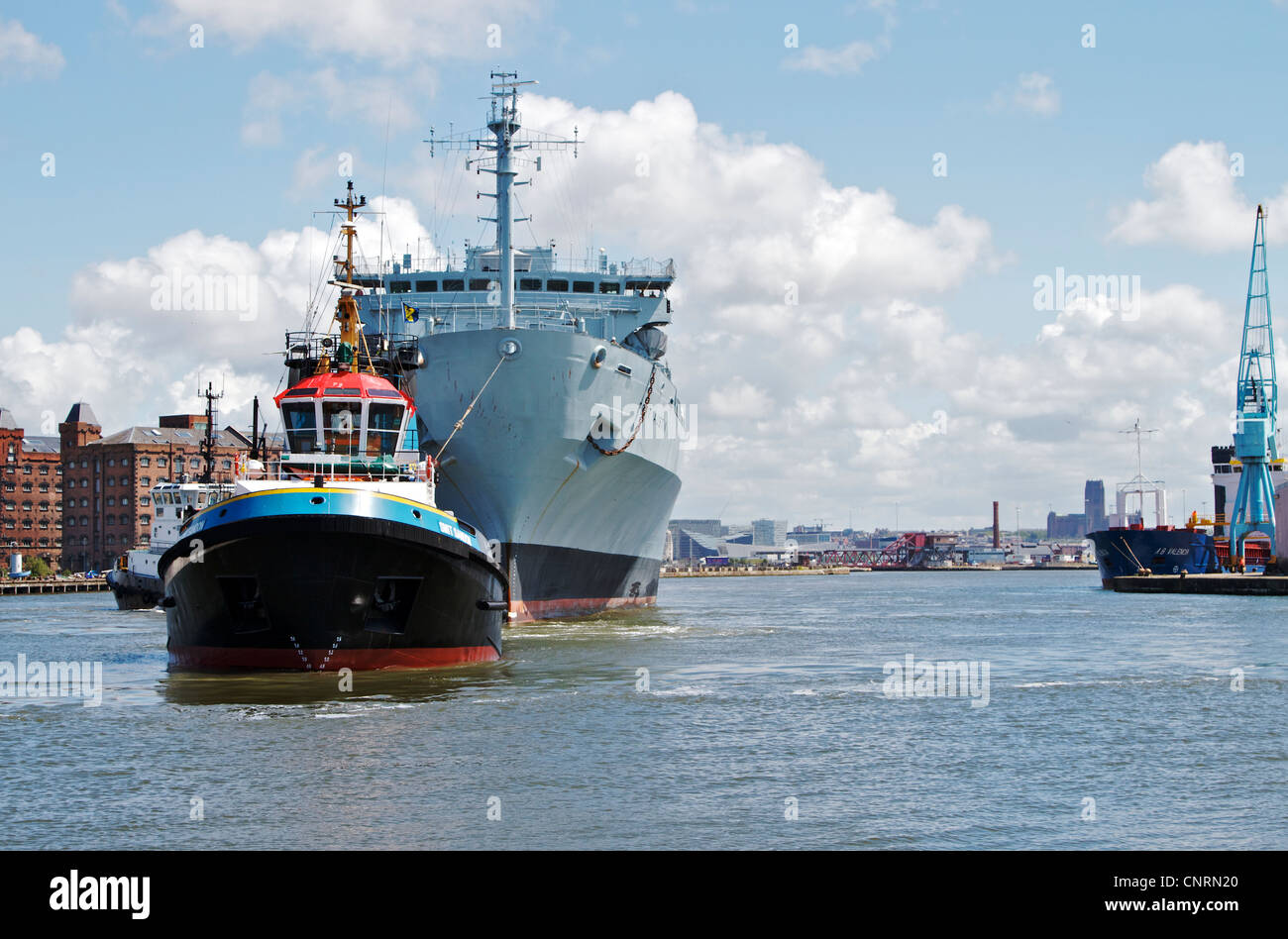Tug SMIT WATERLOO guiding RFA FORT AUSTIN into the Birkenhead dock ...