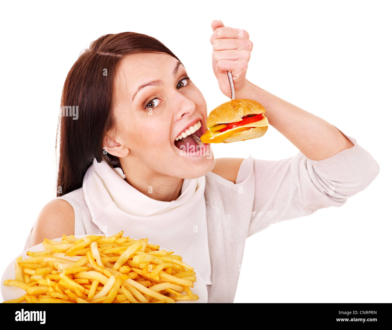 Woman eating fast food. Isolated Stock Photo - Alamy