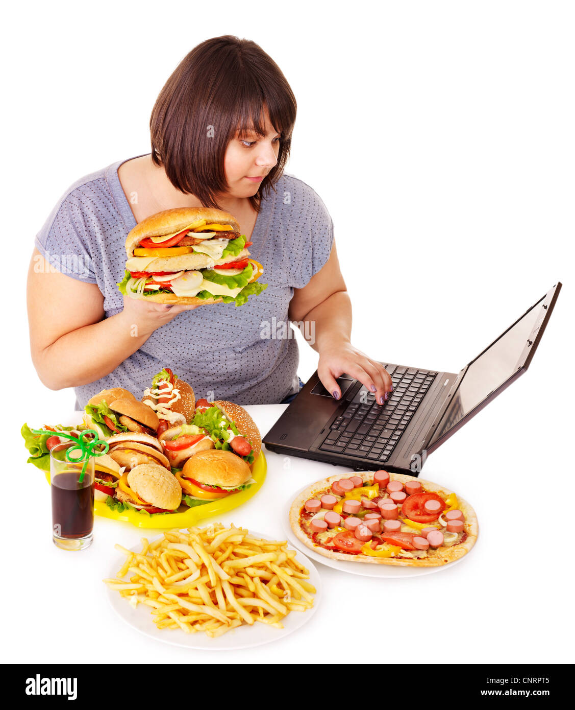 Woman eating fast food at work. Isolated Stock Photo - Alamy