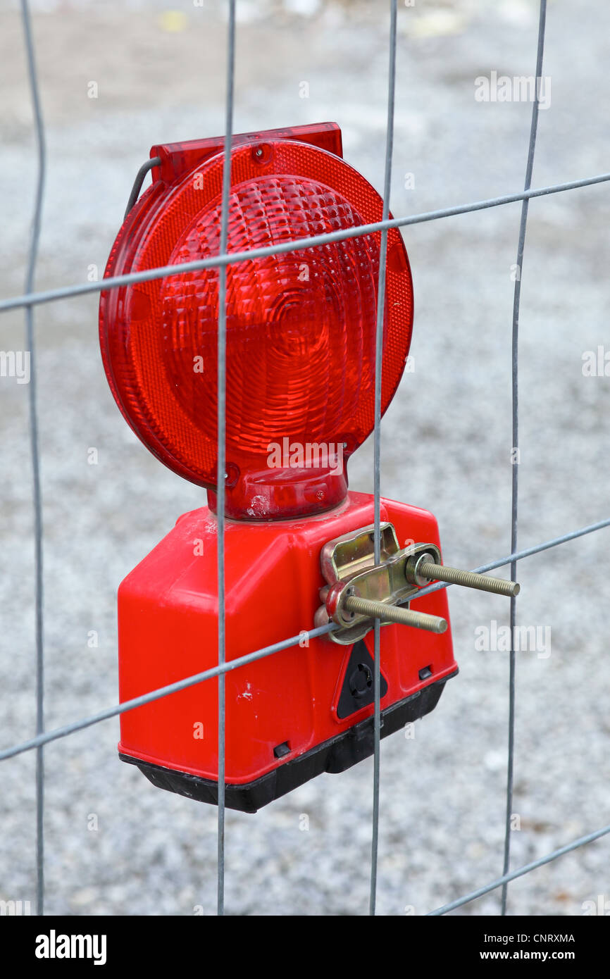Red construction site warning lamp Stock Photo - Alamy