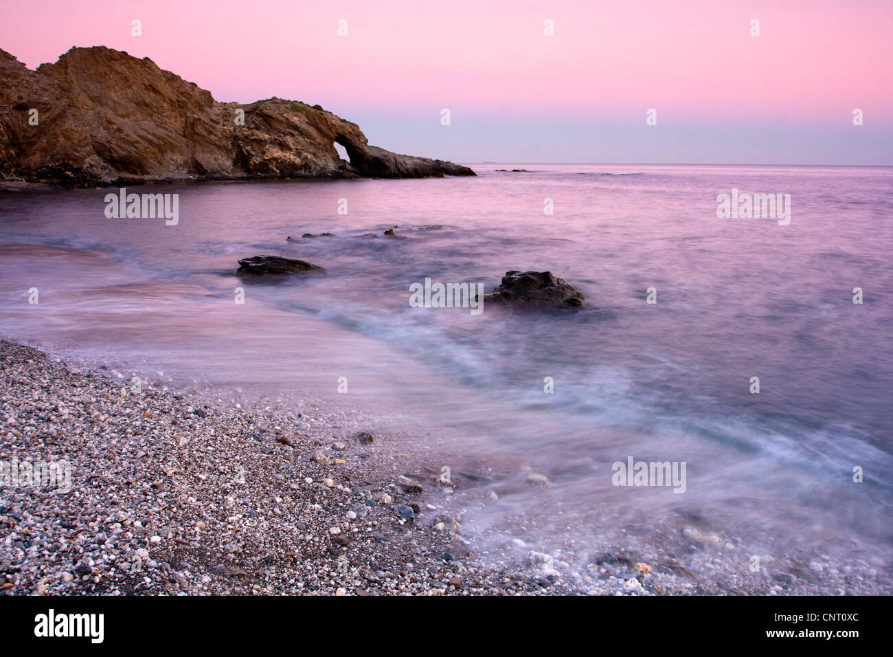 Sunset at volcanic beach, Spain, Andalusia Stock Photo - Alamy