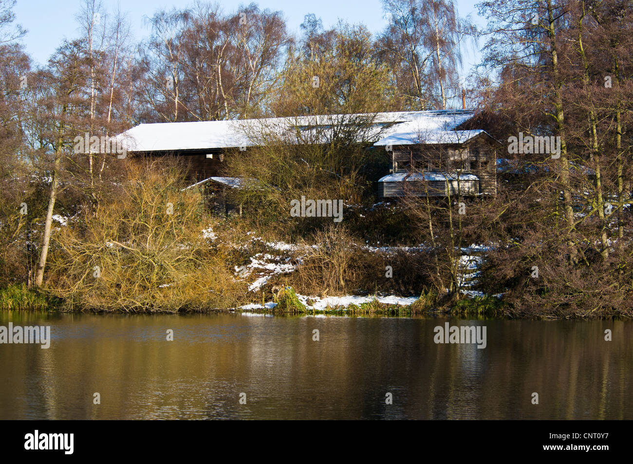 The snow-covered Jeffrey Harrison visitor centre and Grebe Hide ...