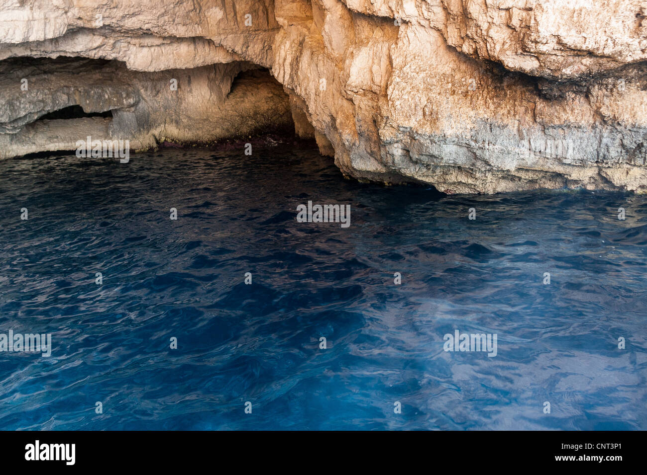 Boat trip between Smugglers Cove and Porto Vroma Stock Photo - Alamy