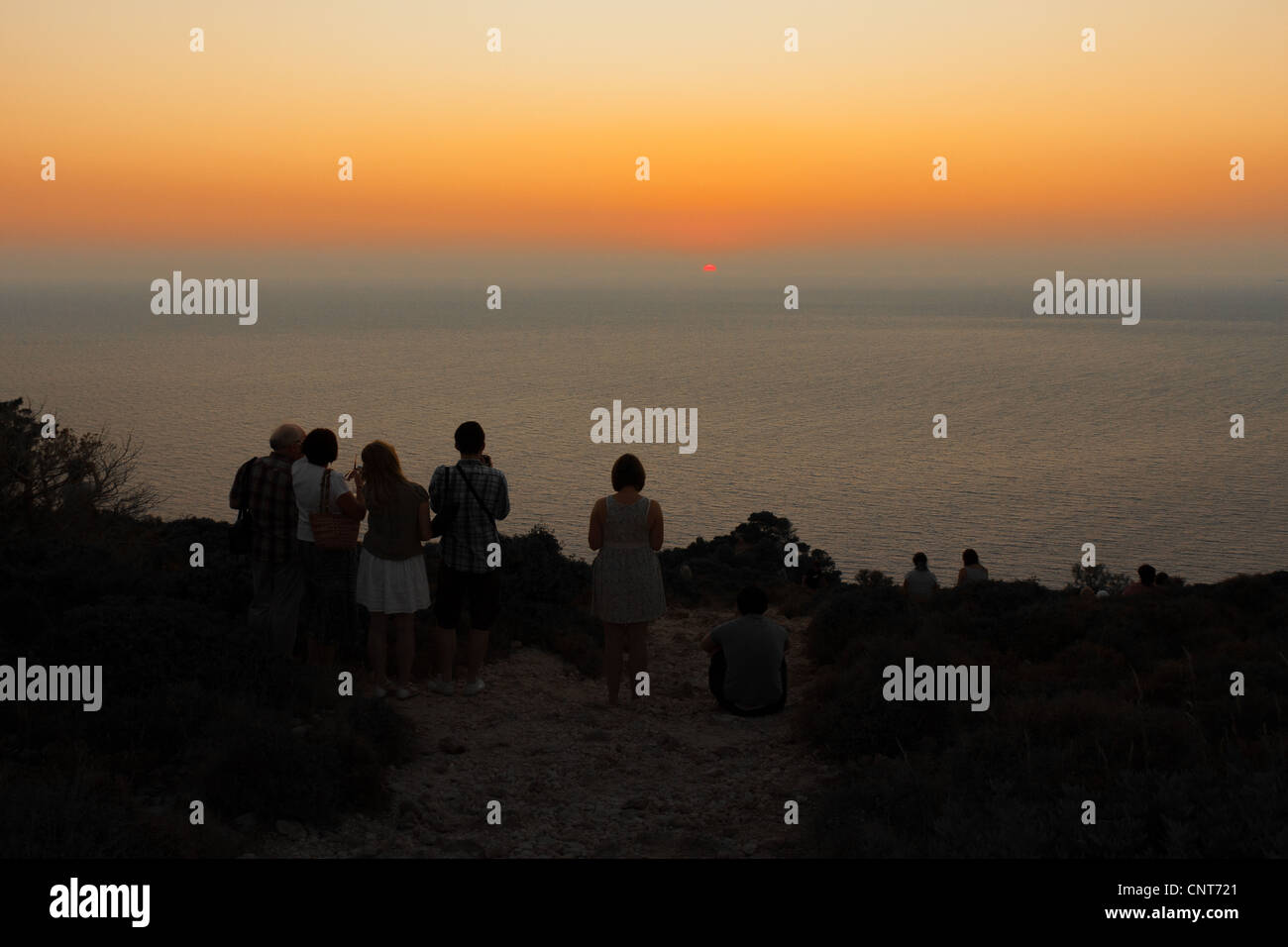 Sunset people watching hi-res stock photography and images - Alamy