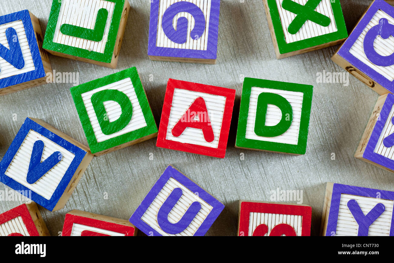 Wooden blocks forming the word DAD in the center Stock Photo - Alamy