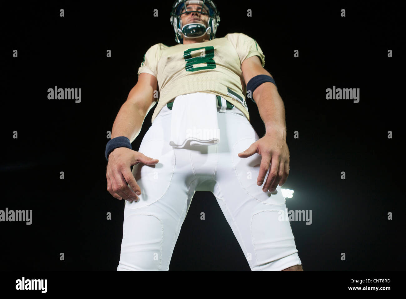 Football player, low angle view Stock Photo - Alamy