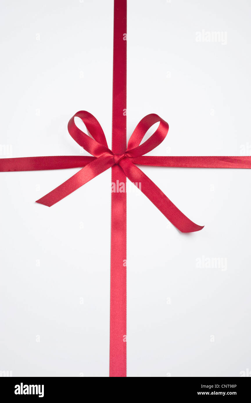 Gift wrapped with bow Stock Photo - Alamy