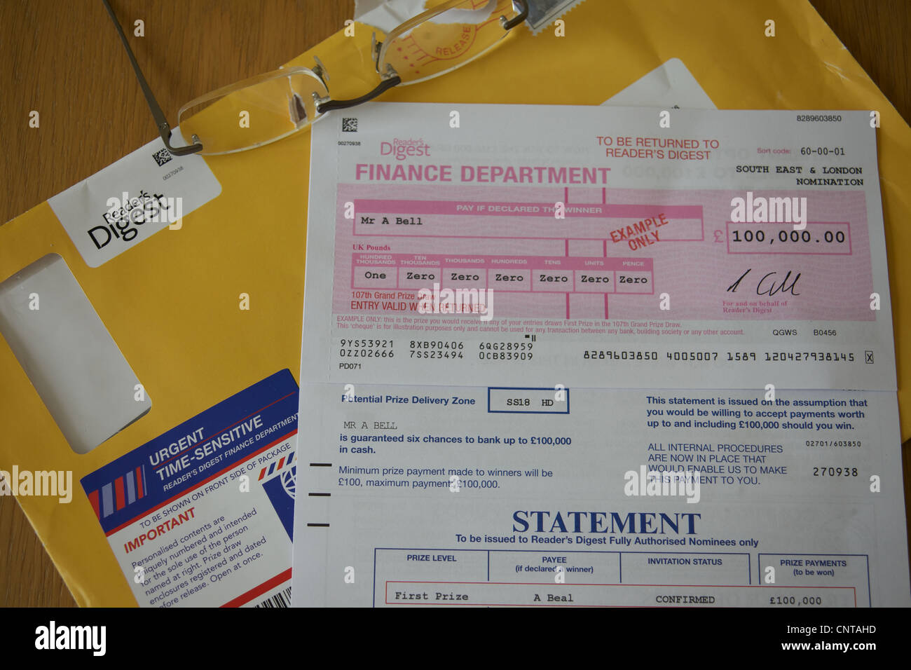 Readers Digest prize cheques Stock Photo - Alamy