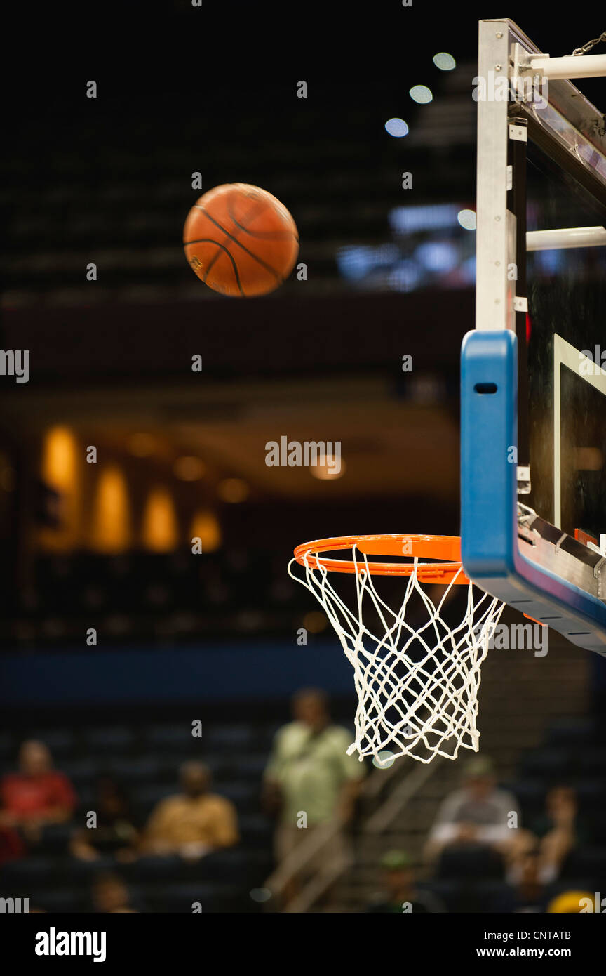 Basketballs in hoops hi-res stock photography and images - Alamy