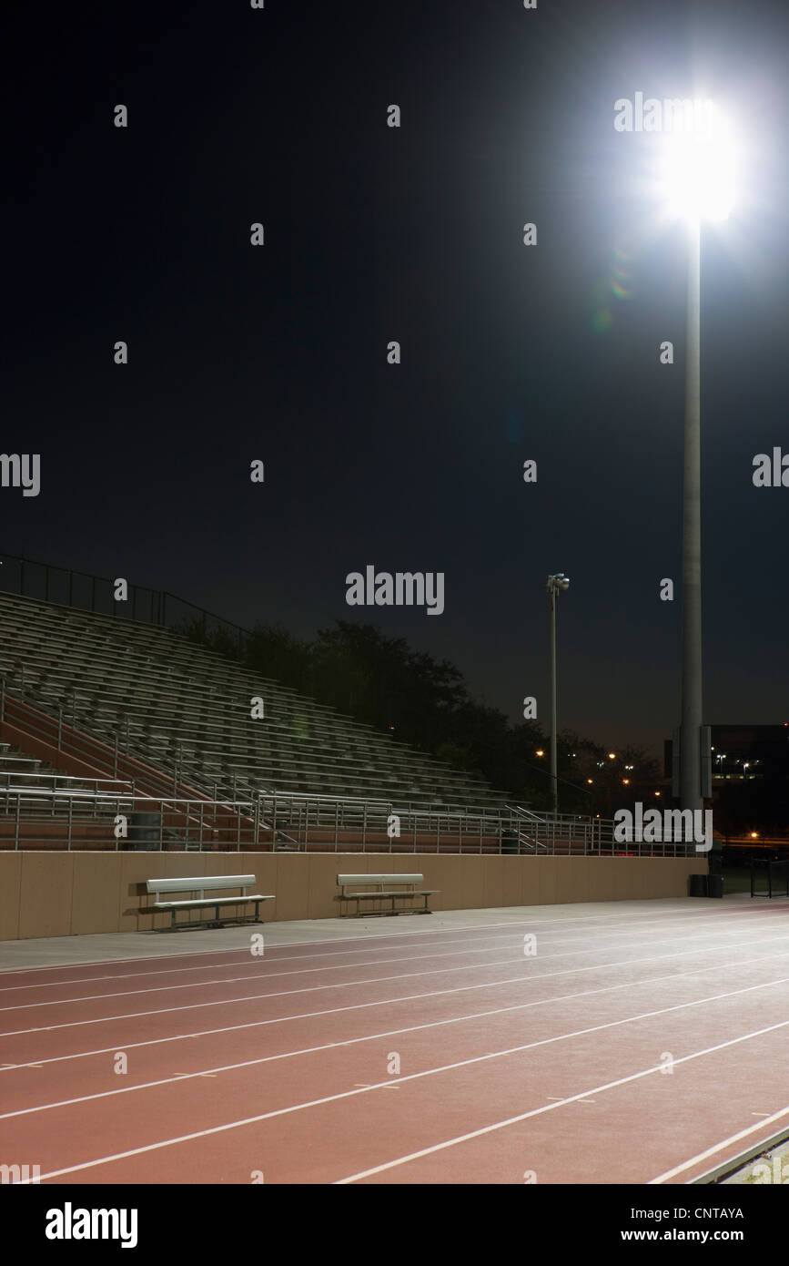 Running track at night Stock Photo - Alamy