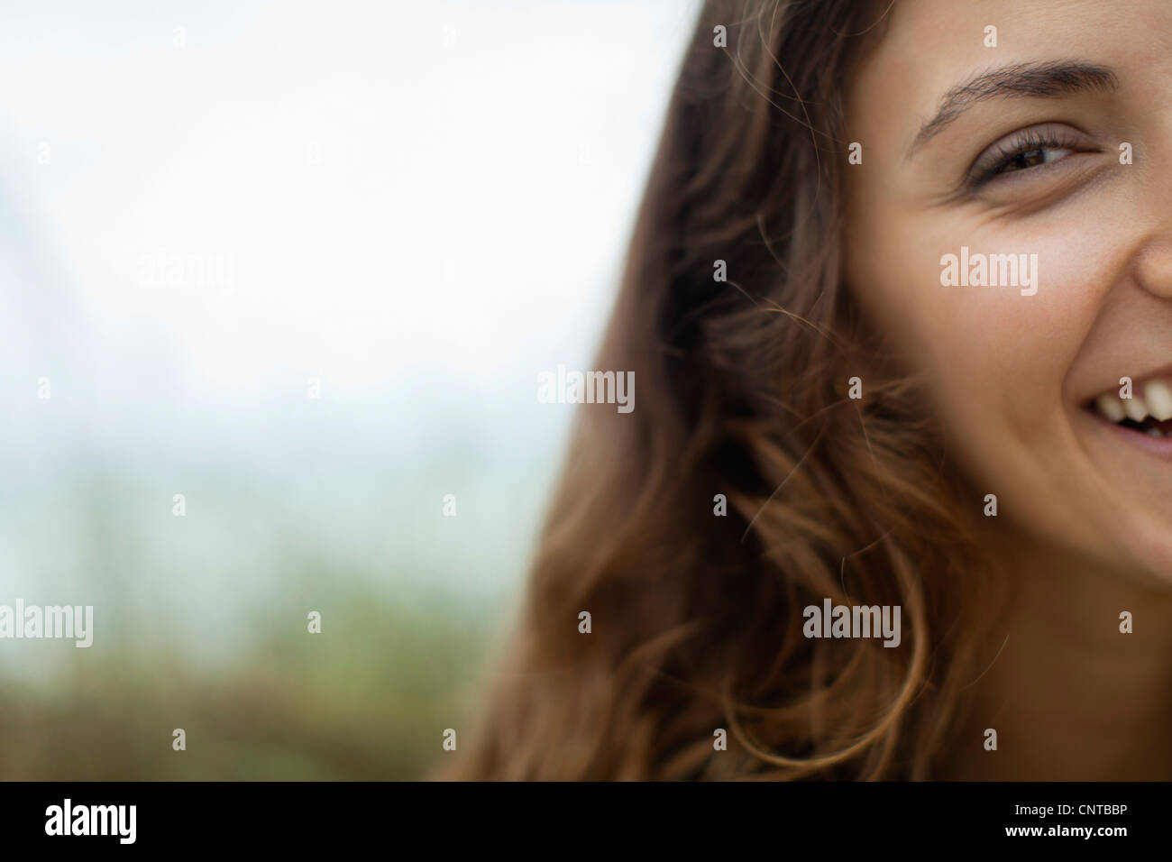 Half of young woman's face, cropped Stock Photo - Alamy