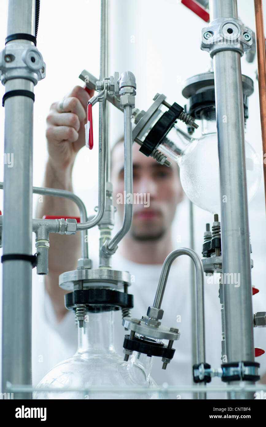 Man working with laboratory equipment Stock Photo - Alamy