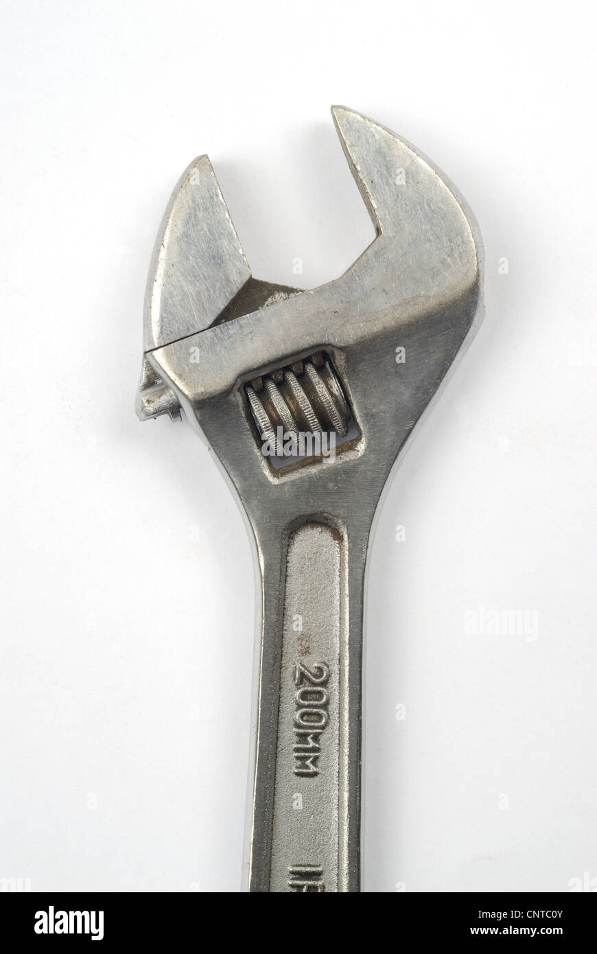 Detail of an adjustable spanner on white background Stock Photo - Alamy
