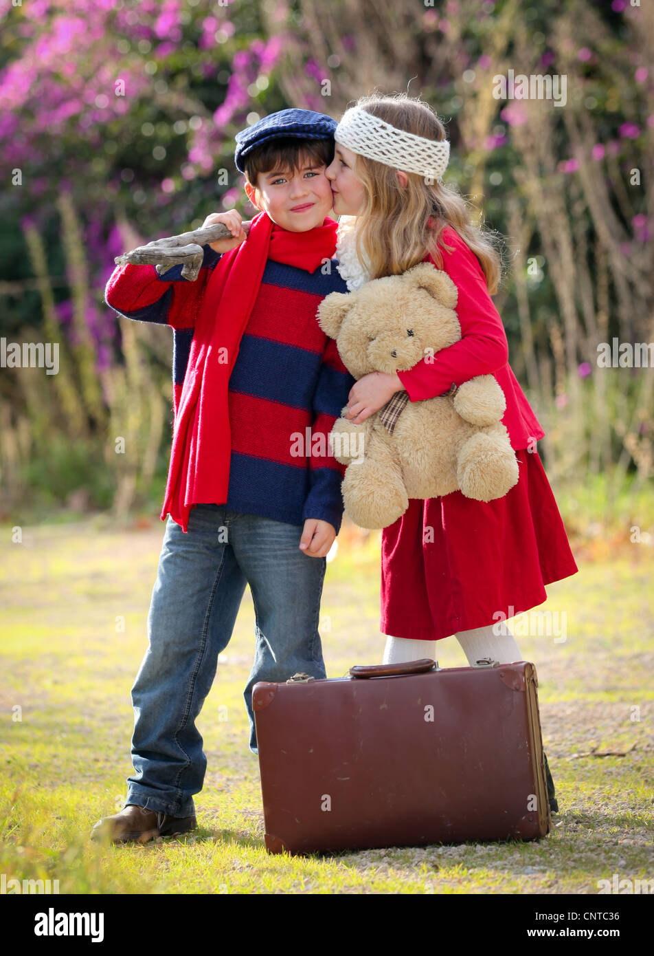 children kissing goodbye Stock Photo - Alamy
