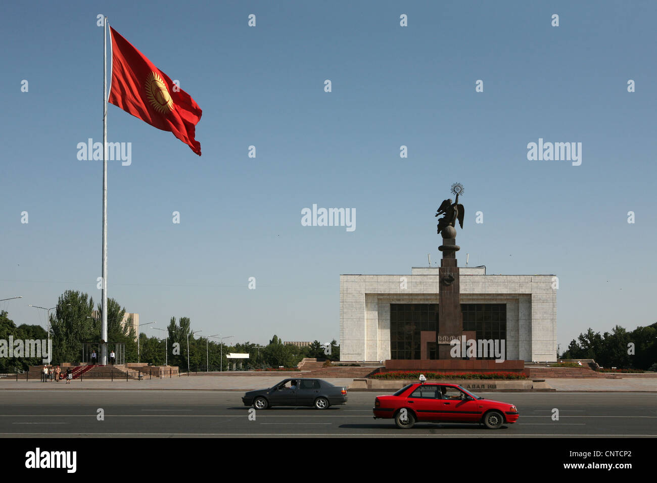 Statue of Erkindik (Freedom) and Kyrgyz national flag in Ala-Too Square ...