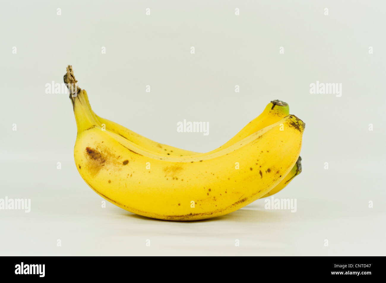 A Bunch of Three Bananas Stock Photo - Alamy