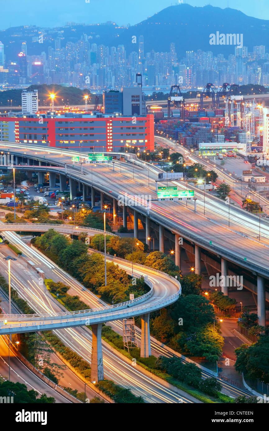 Cargo Terminal and highways at sunset Stock Photo - Alamy