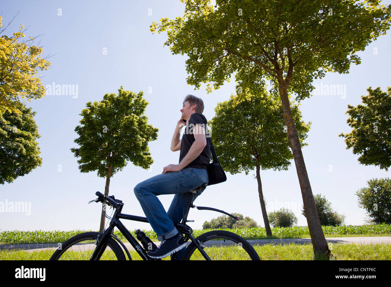 People bike sunny conversation hi-res stock photography and images - Alamy