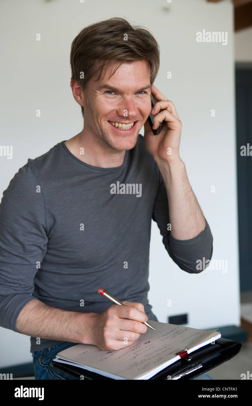 Aged businessman communicating phone working hi-res stock photography ...