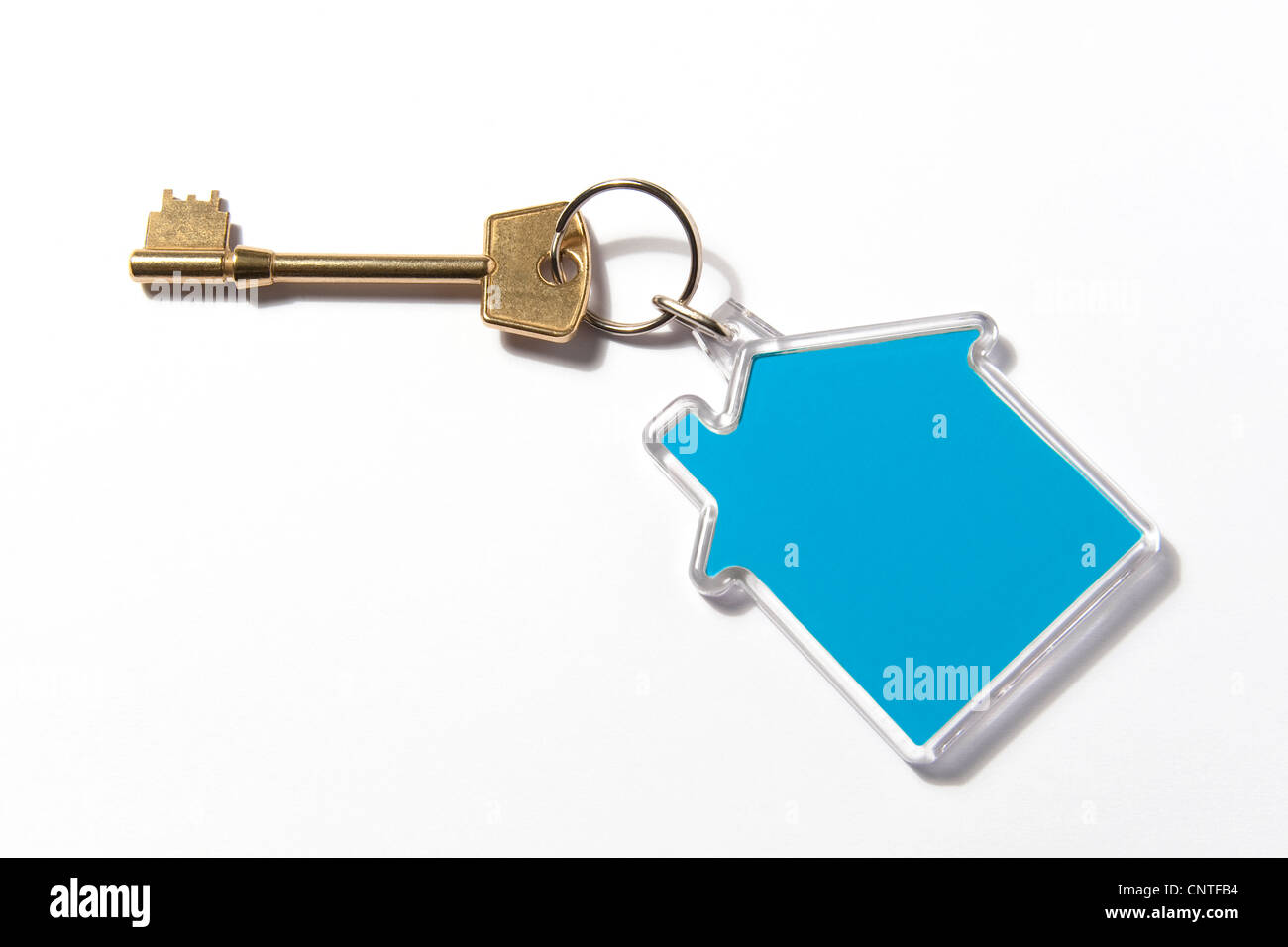 house shaped key ring fob on white background Stock Photo - Alamy