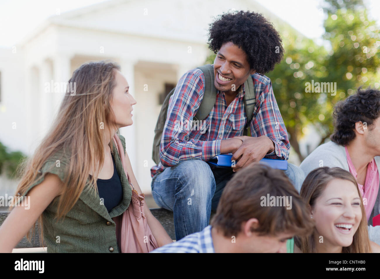 Students talking on campus Stock Photo - Alamy