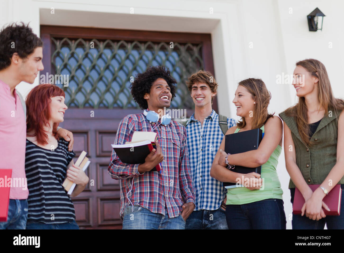 Students talking on campus Stock Photo - Alamy