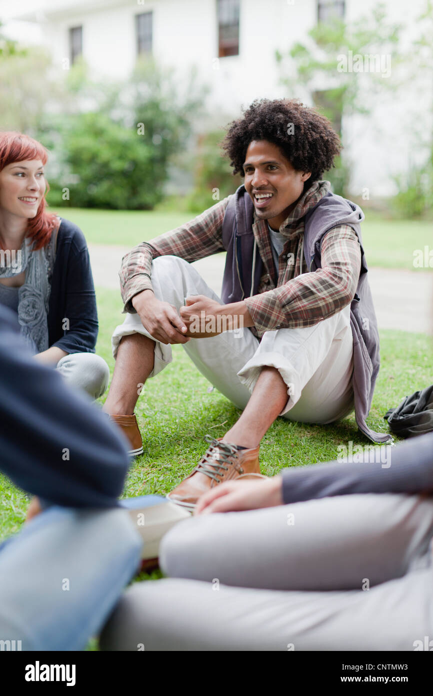 Happy university students conversing hi-res stock photography and ...